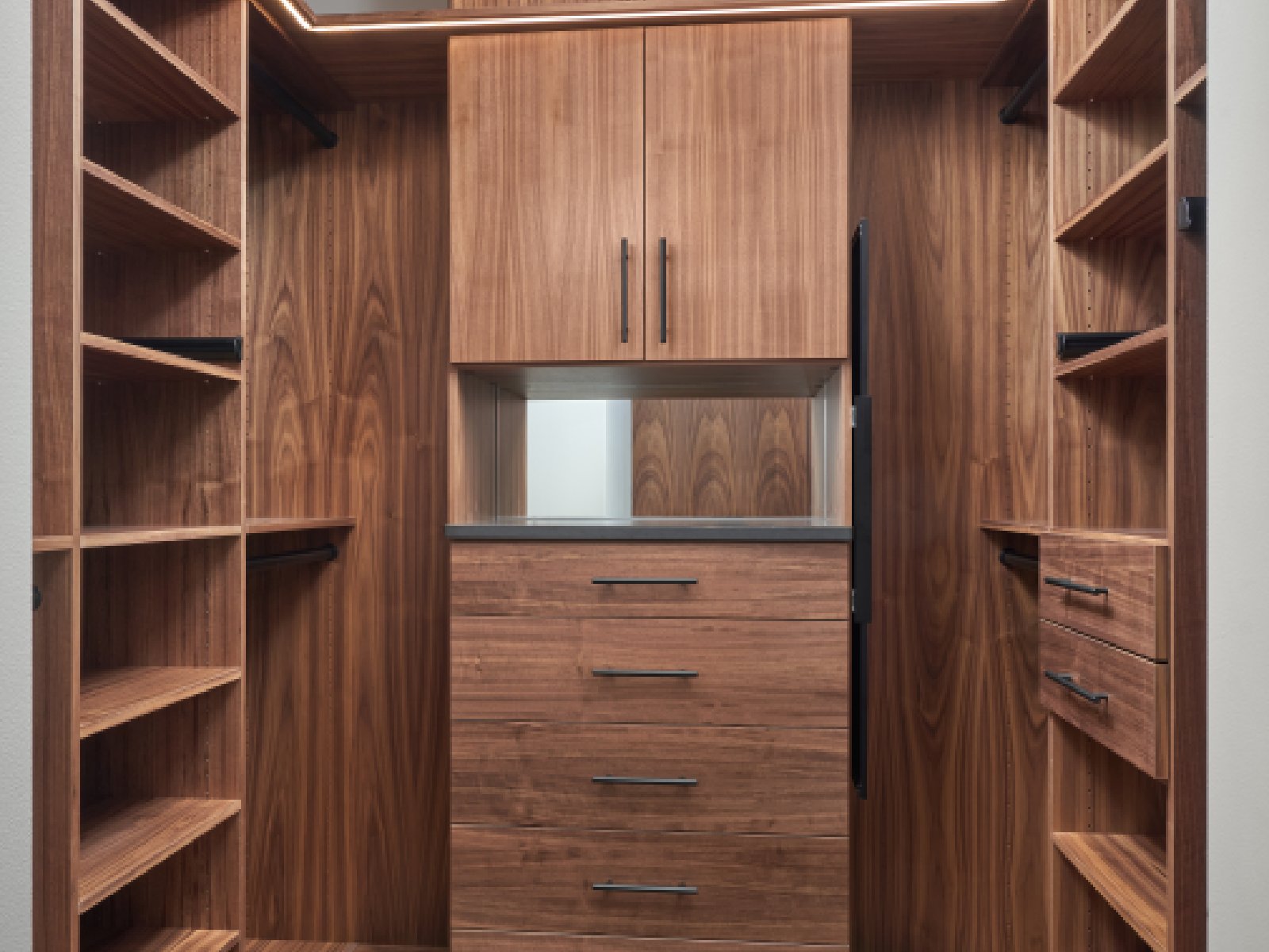 Downtown Sophistication: Luxury Black Walnut Closets | TC Closets